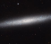 A galaxy on the edge | ESA/Hubble