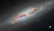 Galactic gas makes a getaway | ESA/Hubble